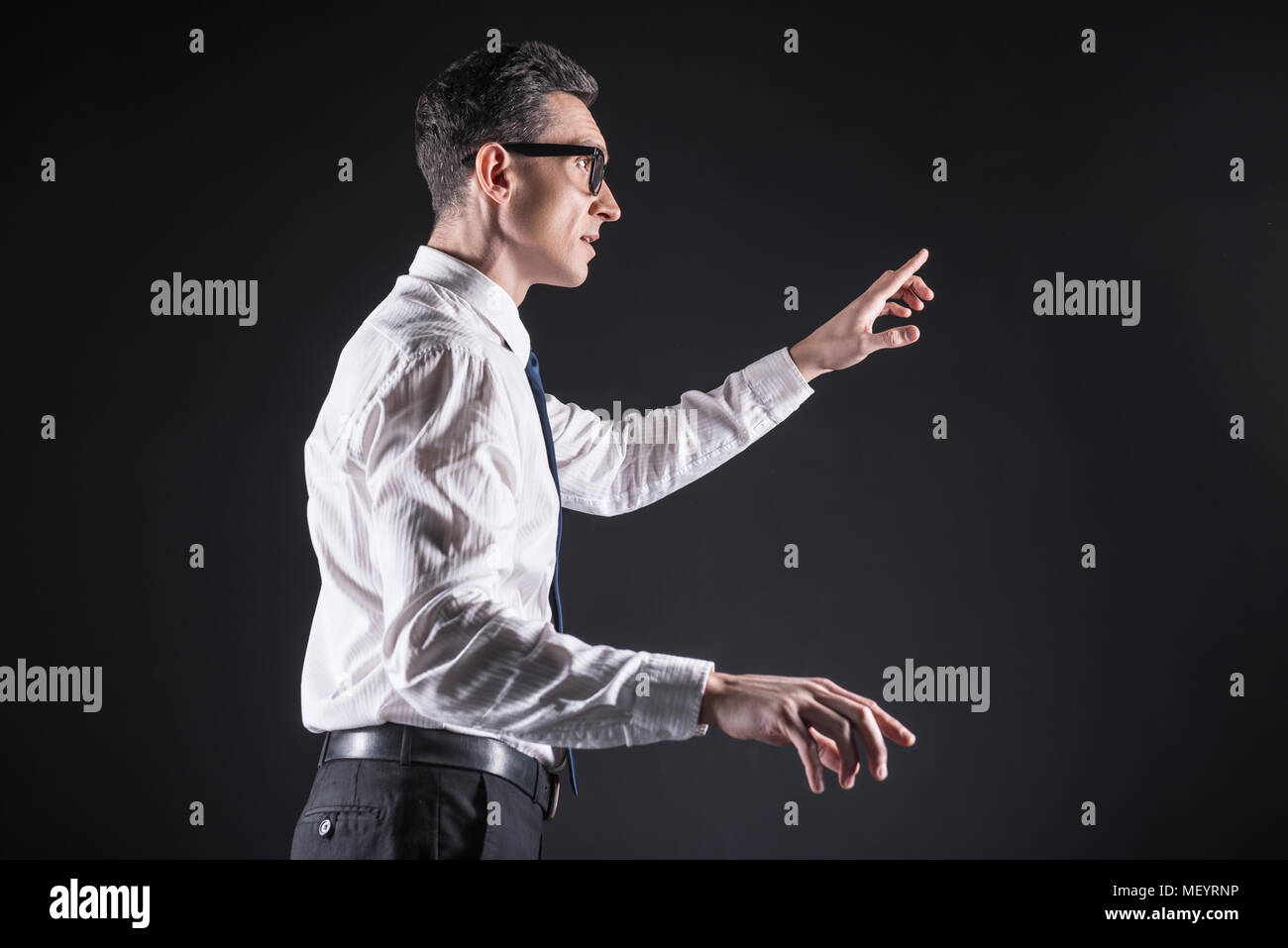 Focusing work handsome young hi-res stock photography and images - Alamy