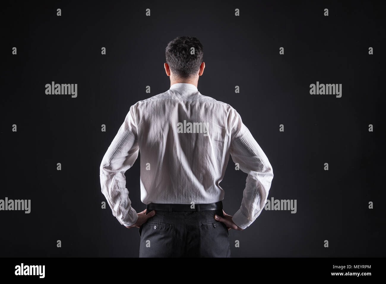 Confident smart man looking at the computer screen Stock Photo - Alamy