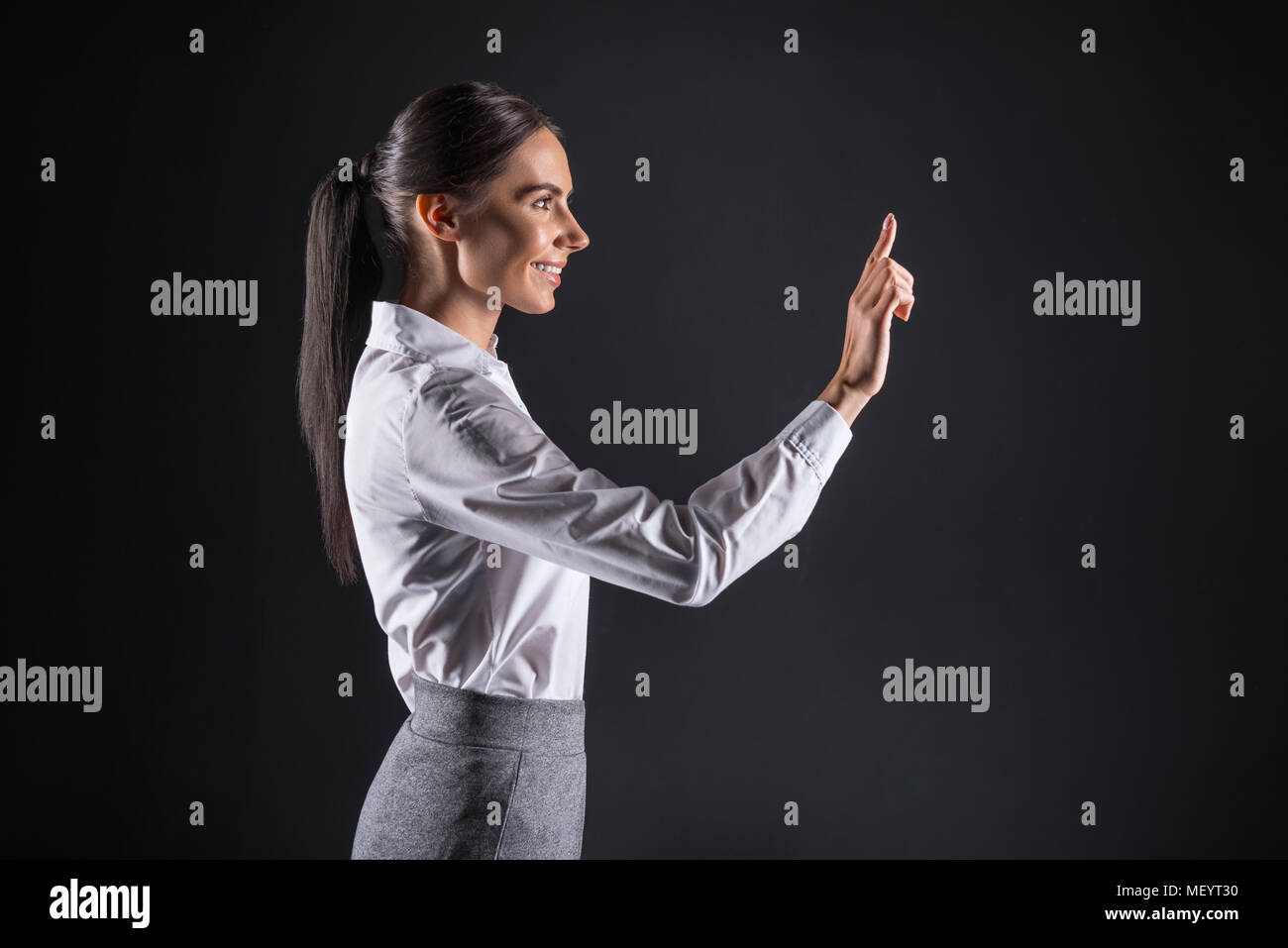 Smart positive businesswoman being at work Stock Photo - Alamy