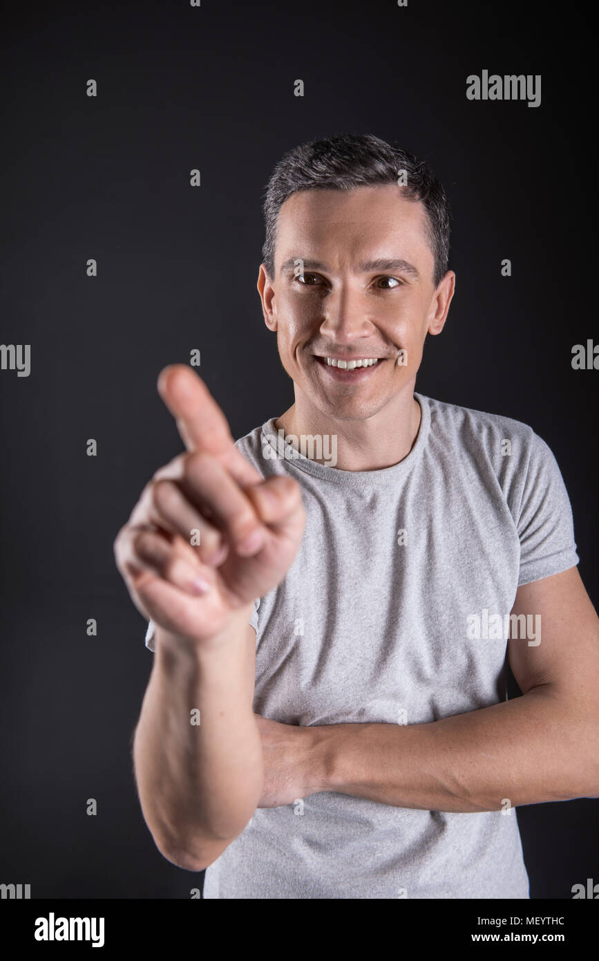 Person touching transparent screen hi-res stock photography and images ...