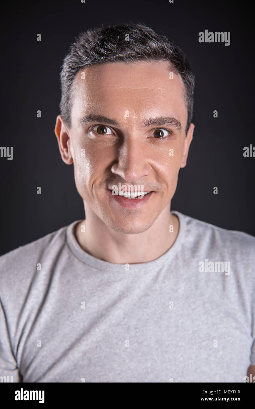 Portrait of a joyful positive man Stock Photo - Alamy