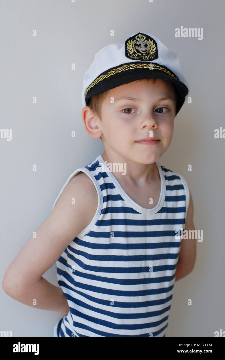 portrait of little cute caucasian boy in captain's hat Stock Photo - Alamy