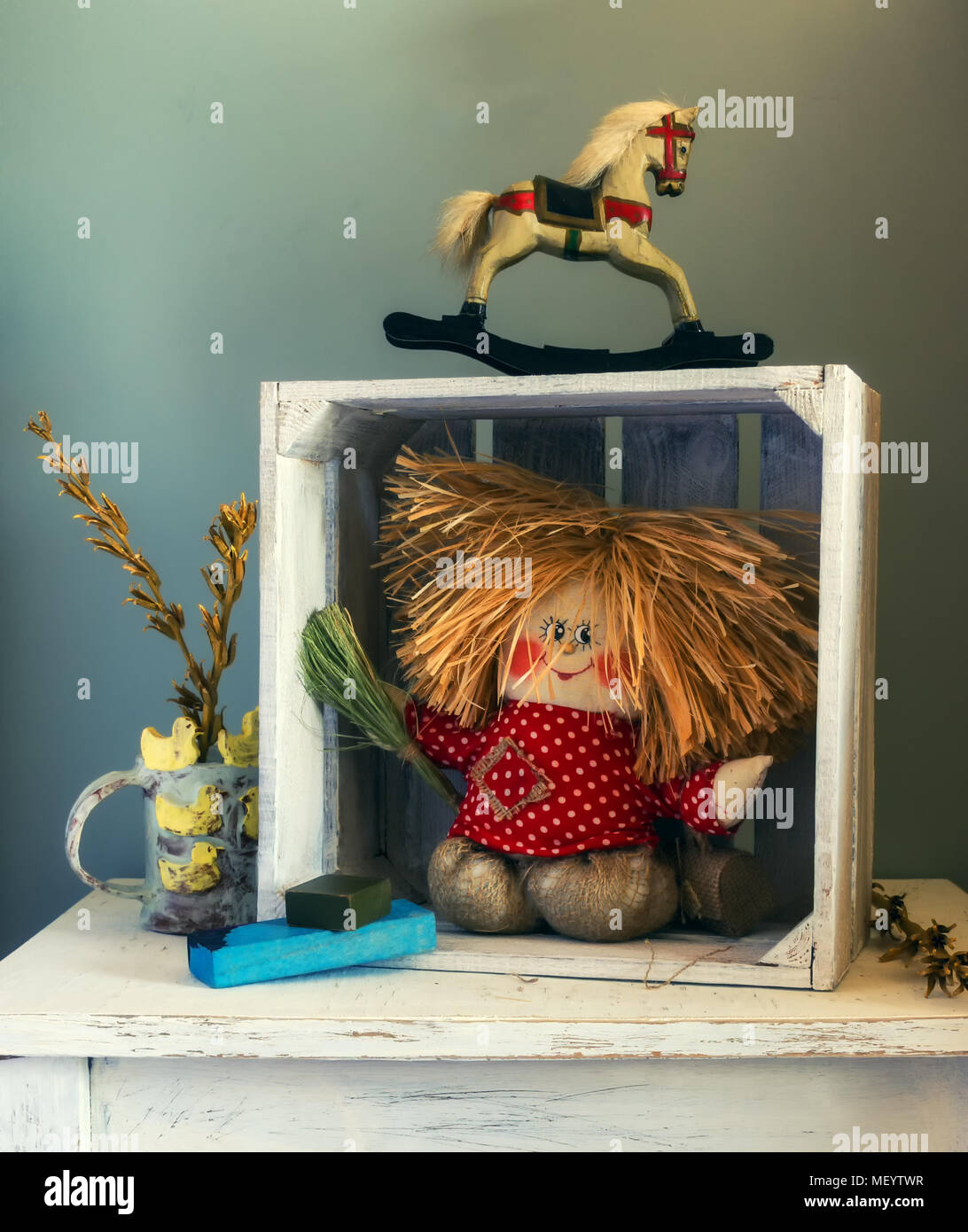 Vintage still life with a box and toys Stock Photo - Alamy