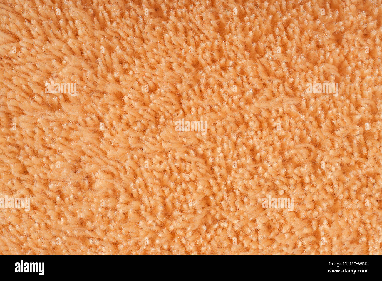 Peach colored texture of soft fluffy fleece with long pile Stock Photo ...
