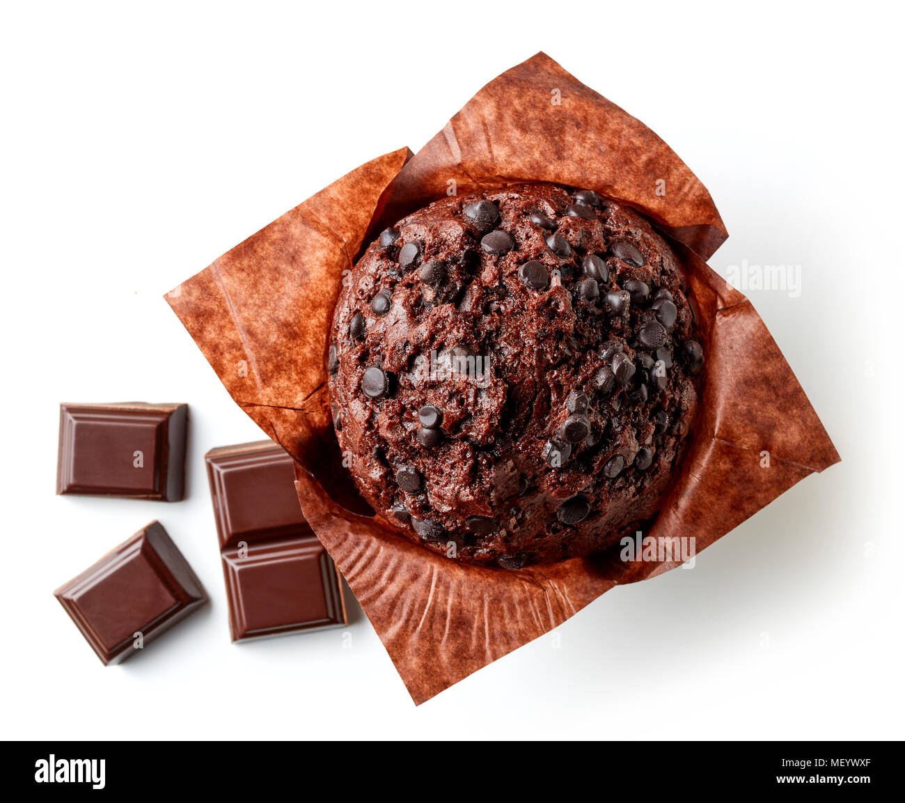 Chocolate muffin in brown paper isolated on white background, top view ...