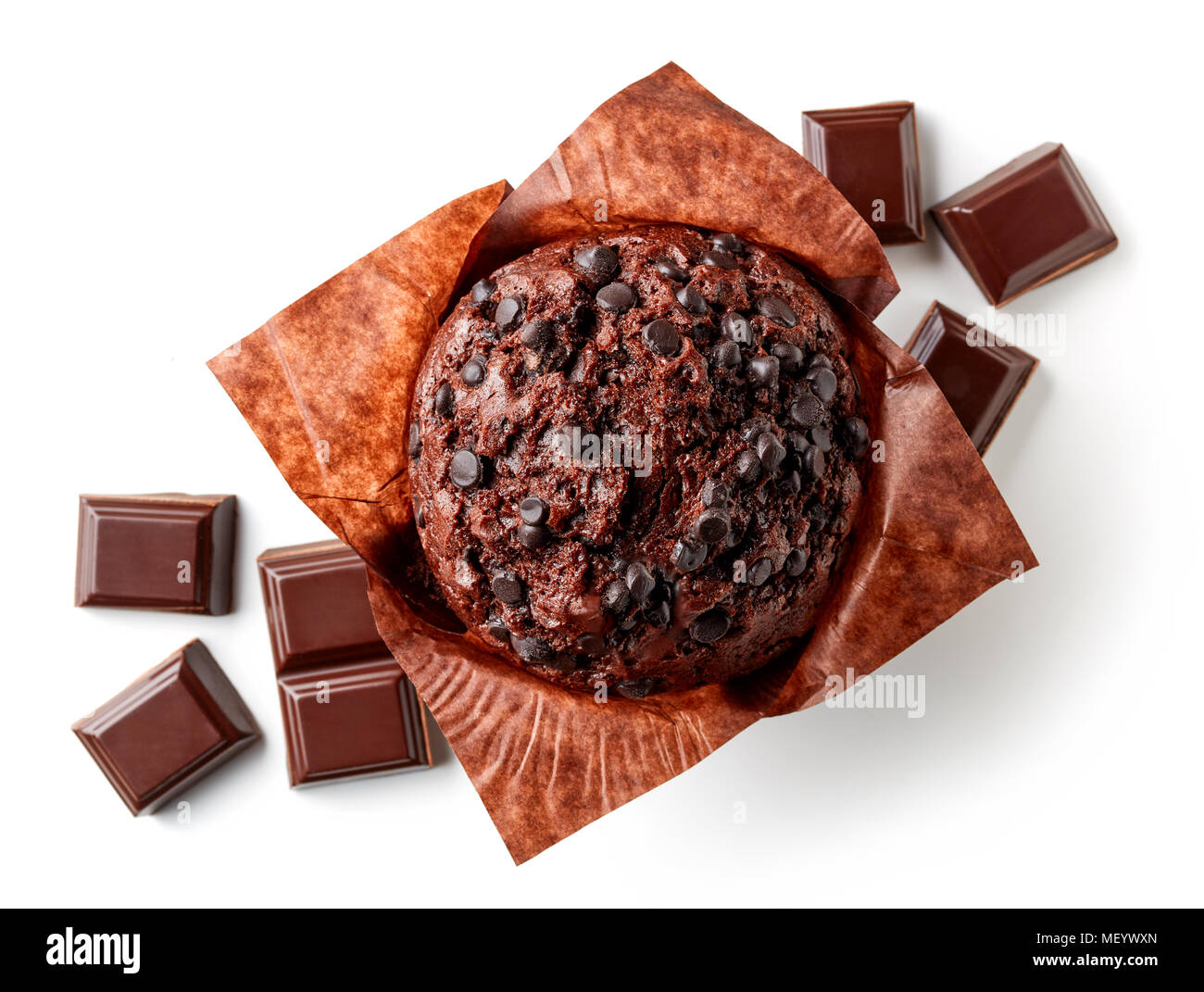 Chocolate muffin in brown paper isolated on white background, top view ...