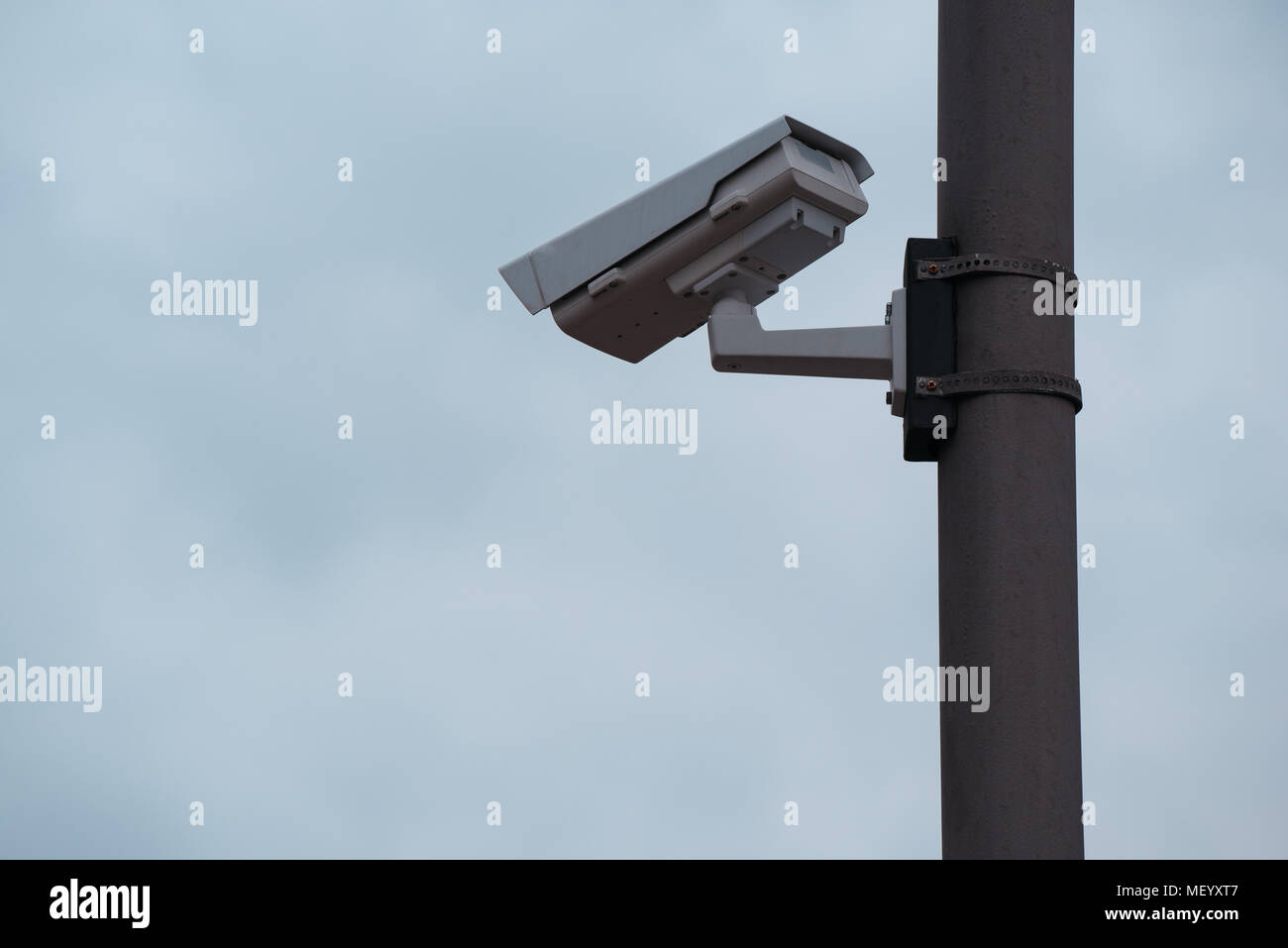 Traffic control surveillance camera mounted on the post Stock Photo - Alamy