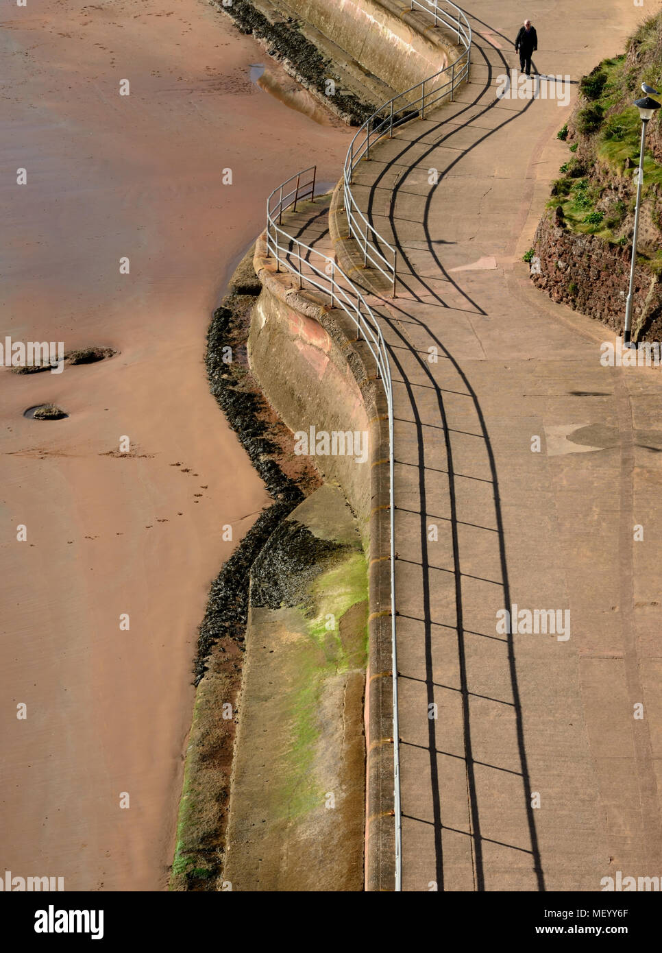 Seafront railings and shadows Stock Photo - Alamy