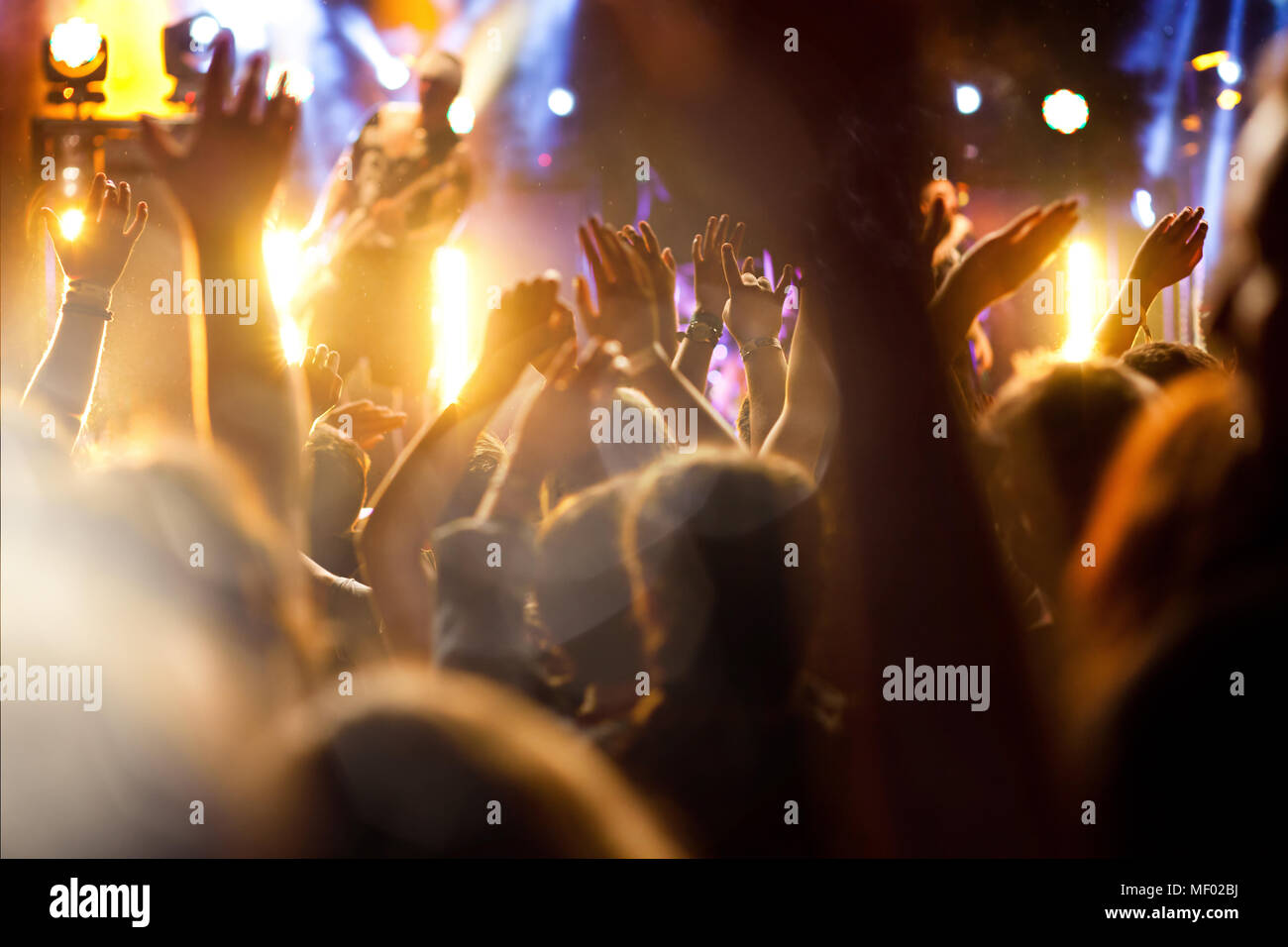 crowd with raised hands at concert - summer music festival Stock Photo ...