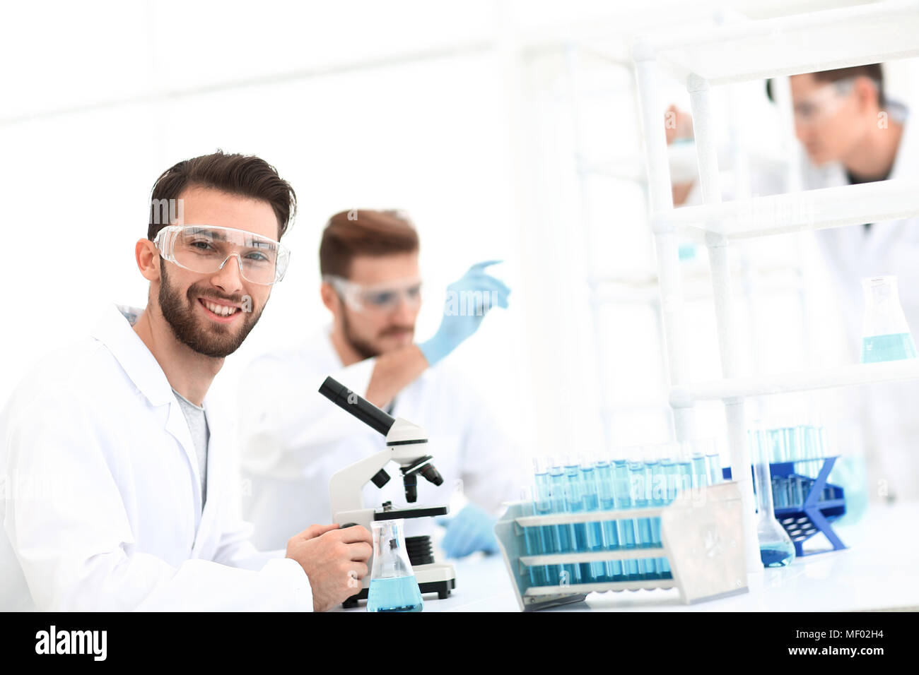 closeup.biologists on blurred background laboratory Stock Photo - Alamy