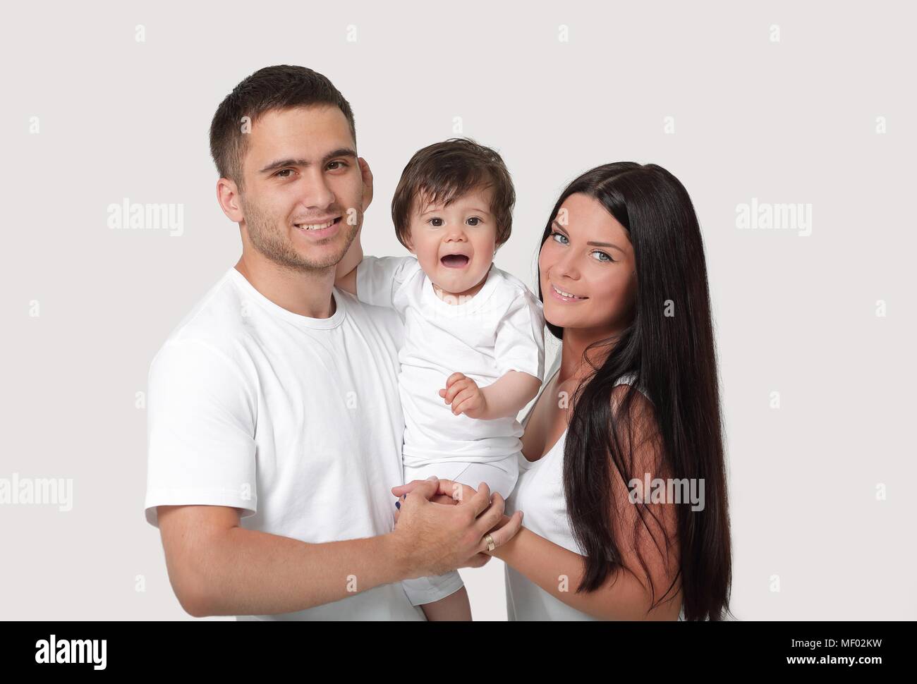 Happy family with newborn baby on a white background Stock Photo - Alamy