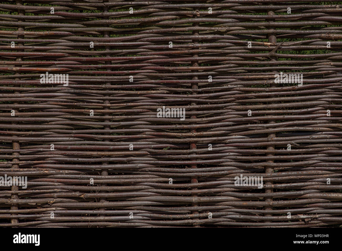 Wooden brown texture of thin rural fence rods Stock Photo - Alamy