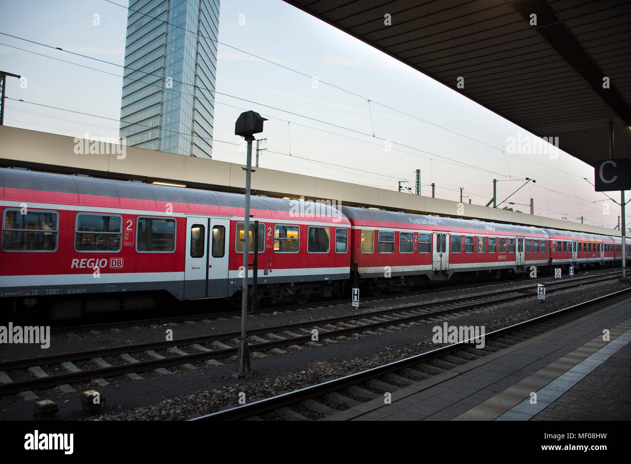 Train stop waiting in terminal for send and receive passengers people ...