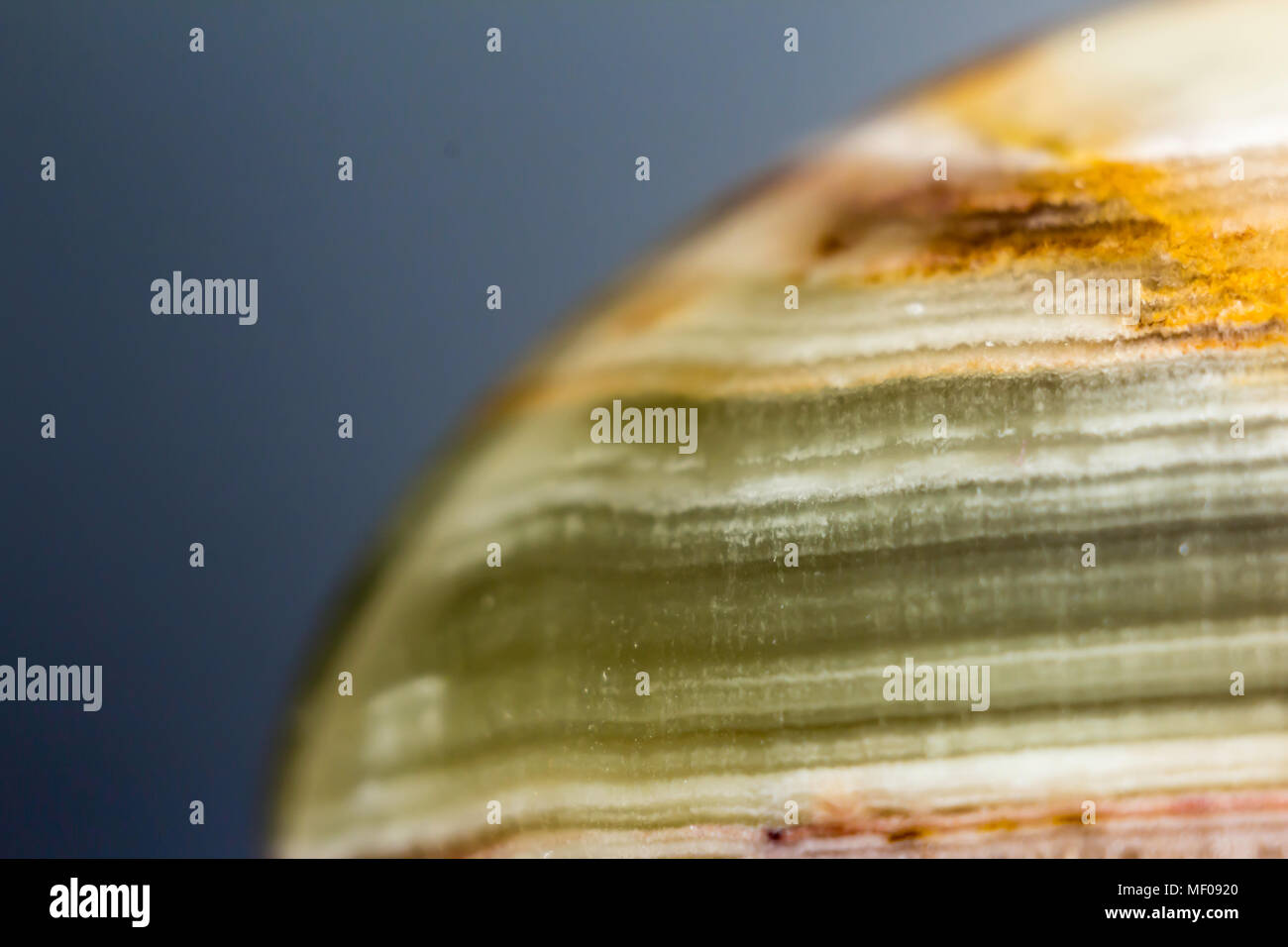 Macro photo texture of polished onyx stone on a gray background. Photo ...