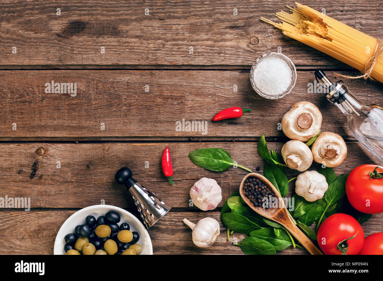 Italian food ingredients for the preparation pasta on wooden background ...