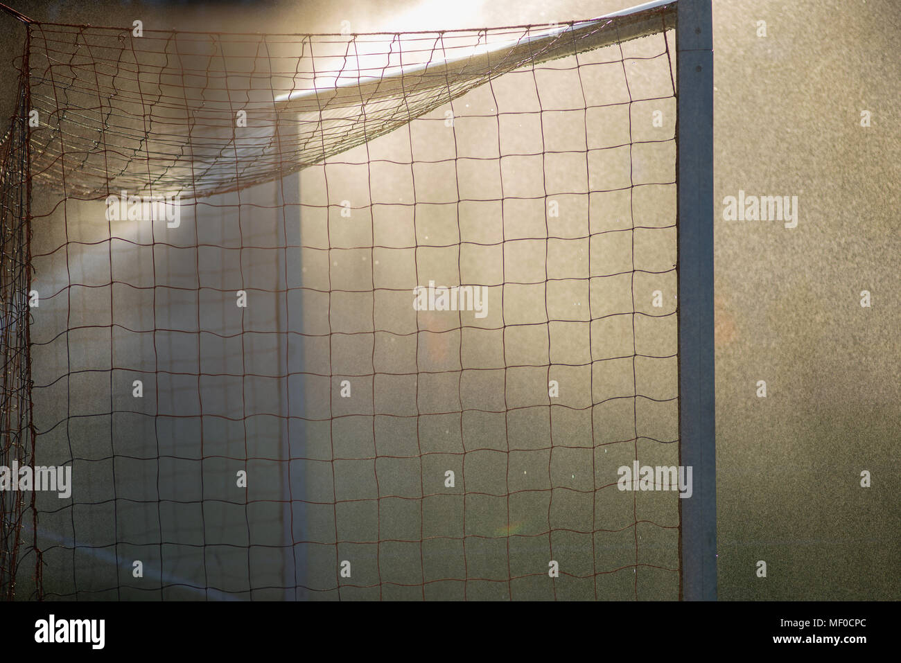 Football soccer sport gates on rainy field Stock Photo - Alamy