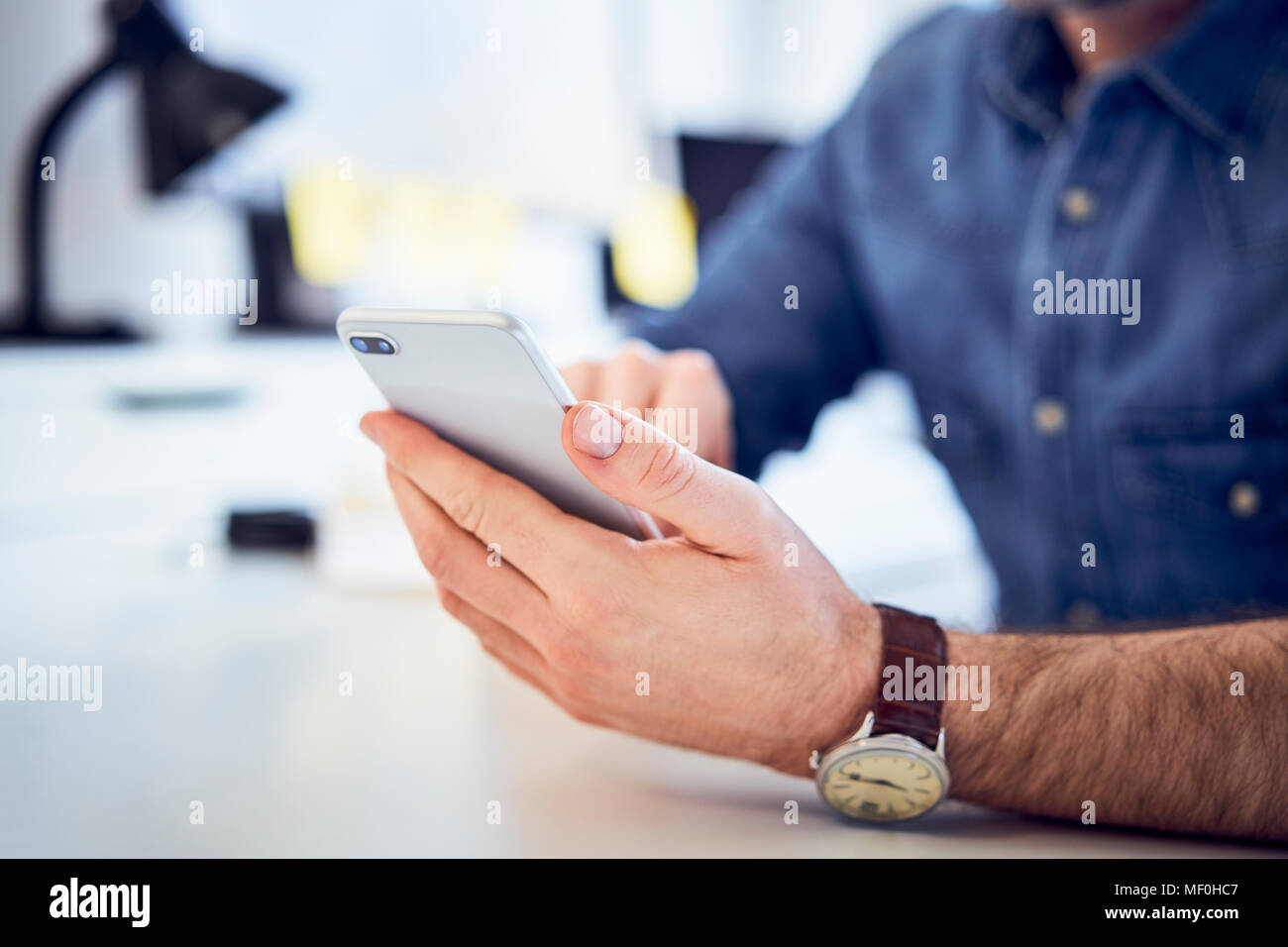 Small office employee on the phone hi-res stock photography and images ...
