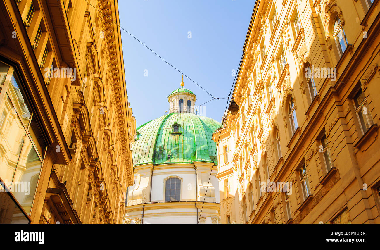 Church between the houses in Vienna Stock Photo - Alamy