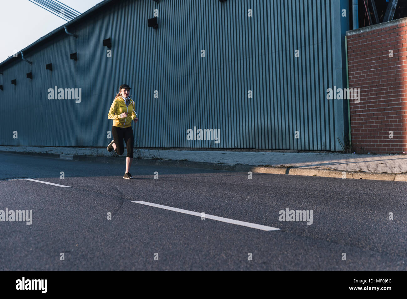 Running track street hi-res stock photography and images - Alamy