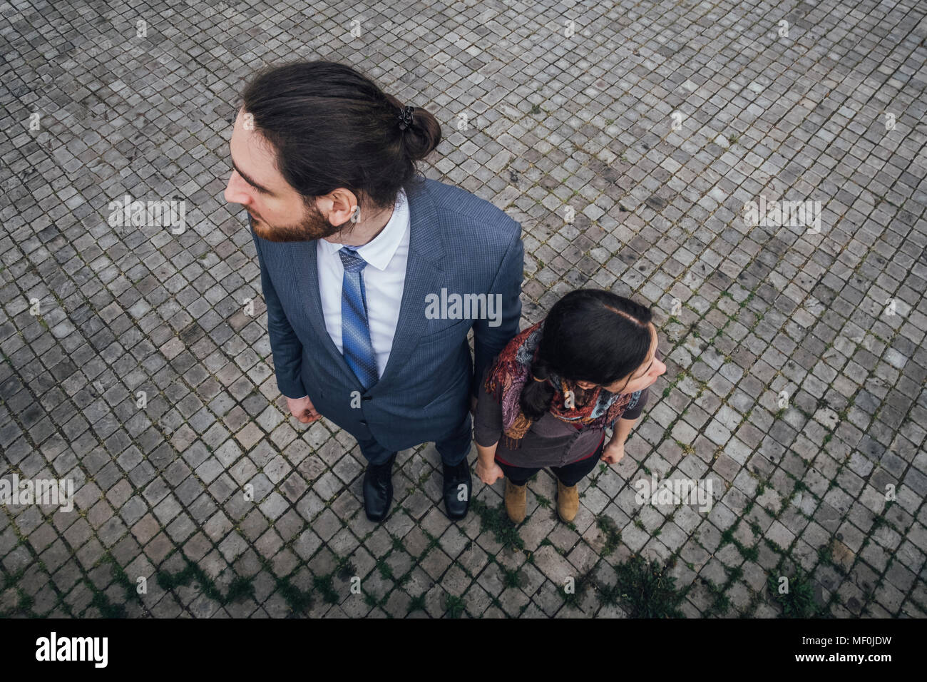 Man woman opposite directions hi-res stock photography and images - Alamy