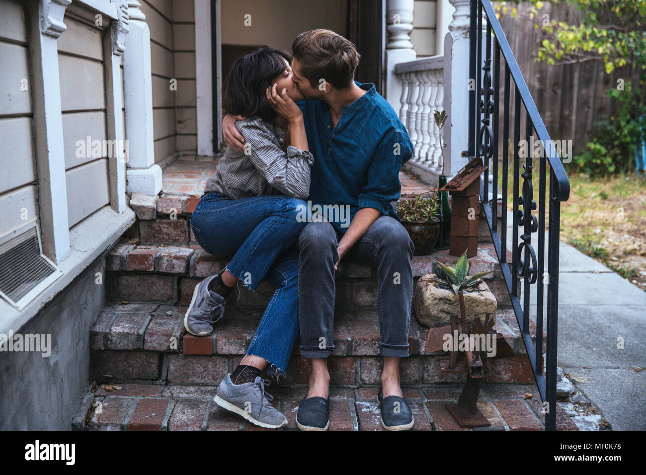 Man sitting on stoop hi-res stock photography and images - Alamy