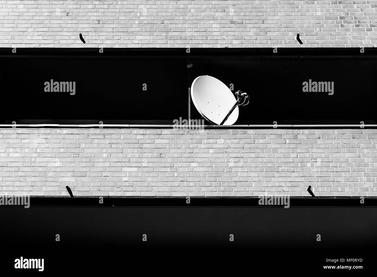 Satellite dish at balcony of residential building Stock Photo - Alamy