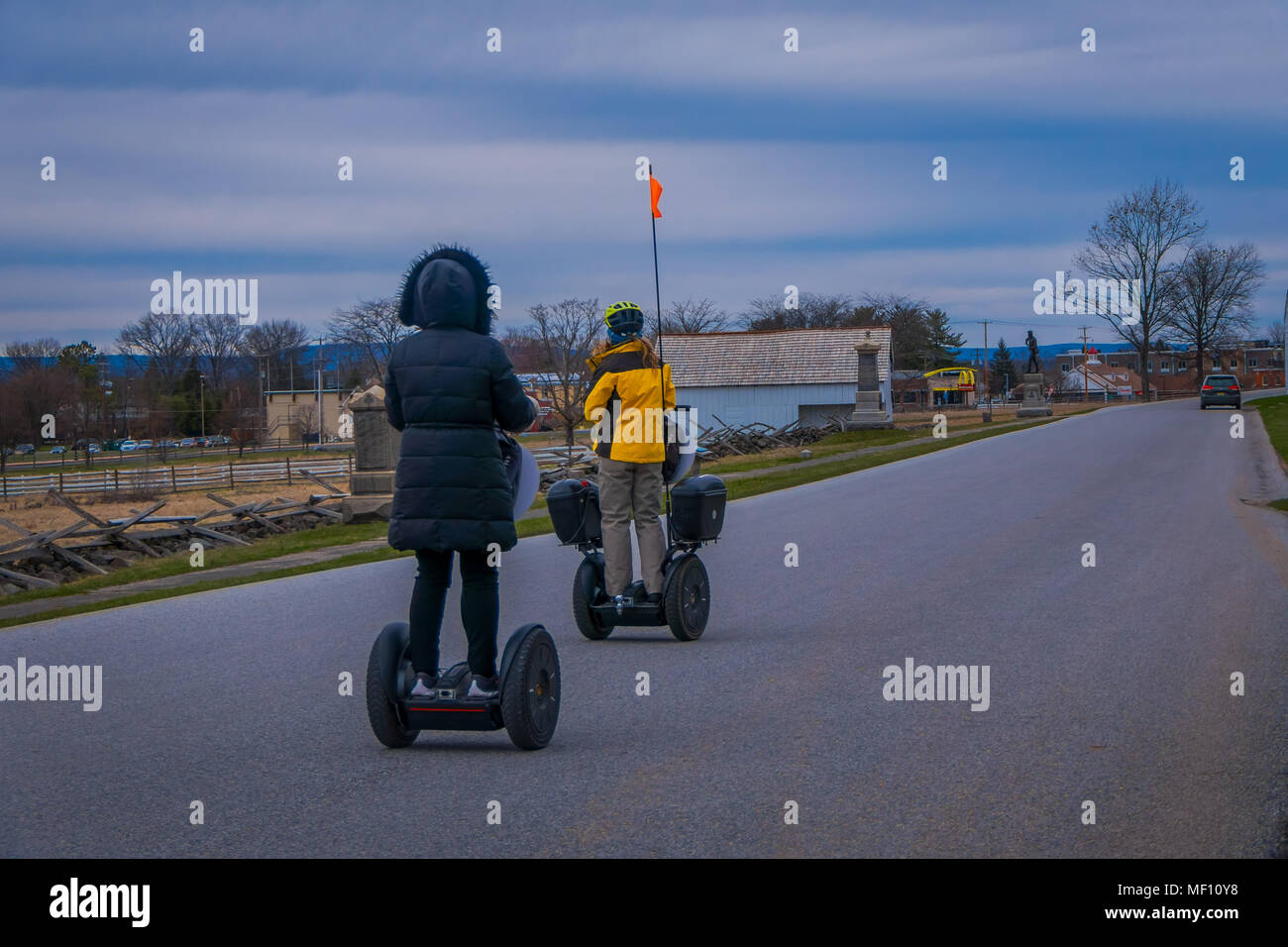 GETTYSBURG, USA - APRIL, 18, 2018: Back view line of tourists on ...