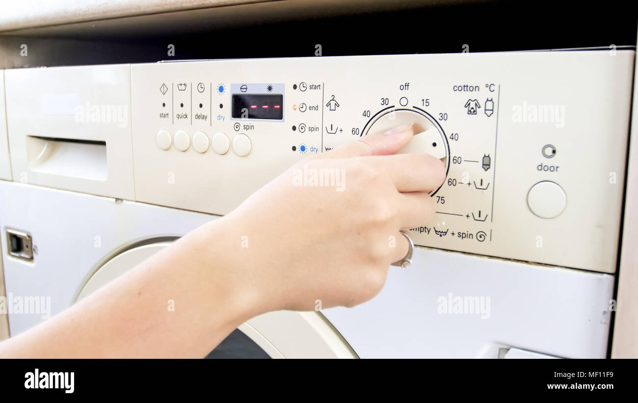 Female finger choosing setting mode hi-res stock photography and images ...