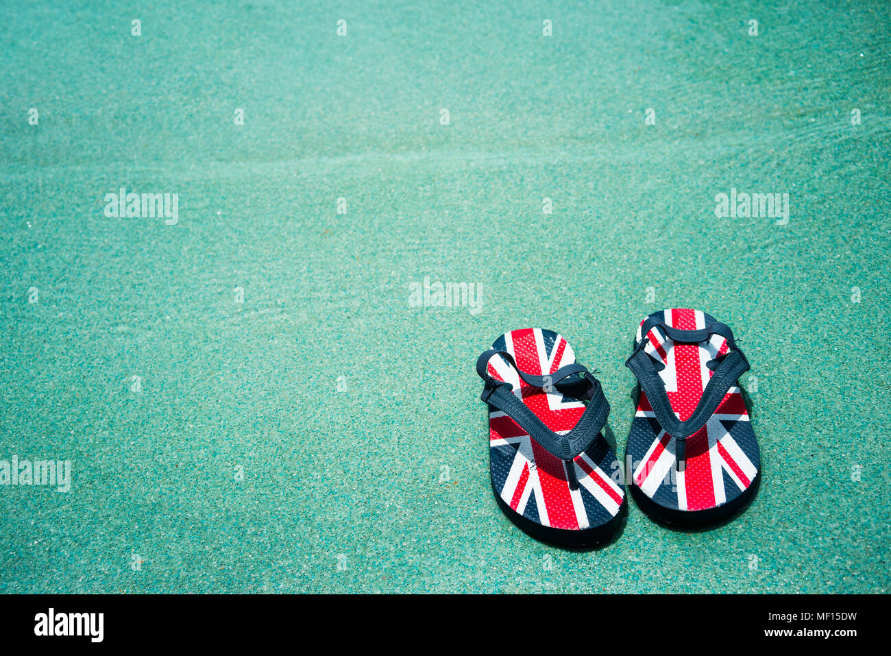 A Pair of Slippers in Pool Side Stock Photo - Alamy