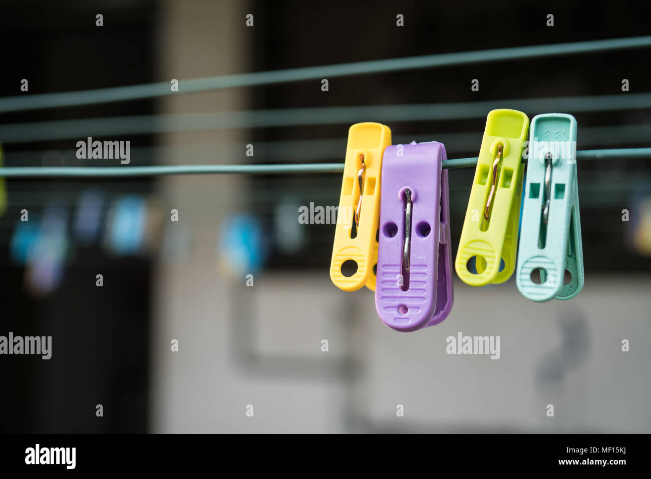 Small clothes pegs hi-res stock photography and images - Alamy