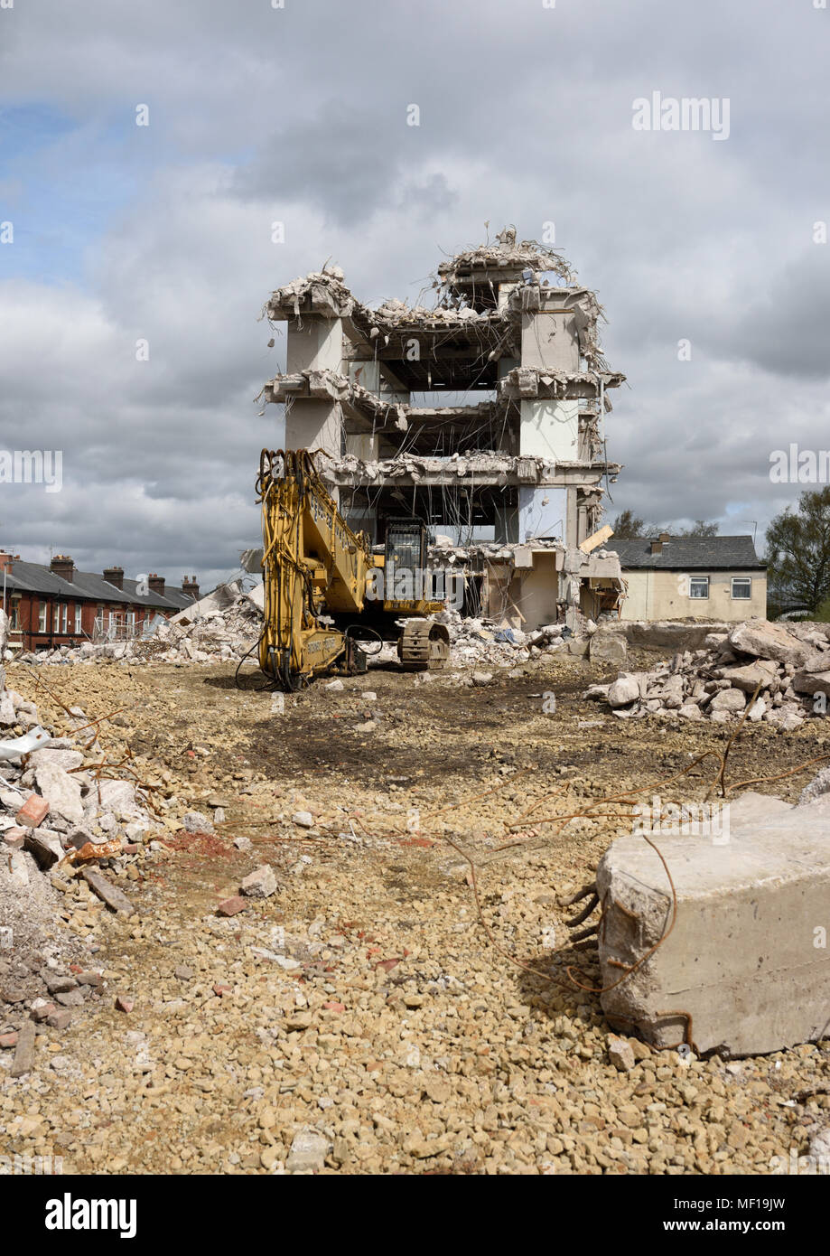 Demolition site partly demolished reinforced concrete building, high ...