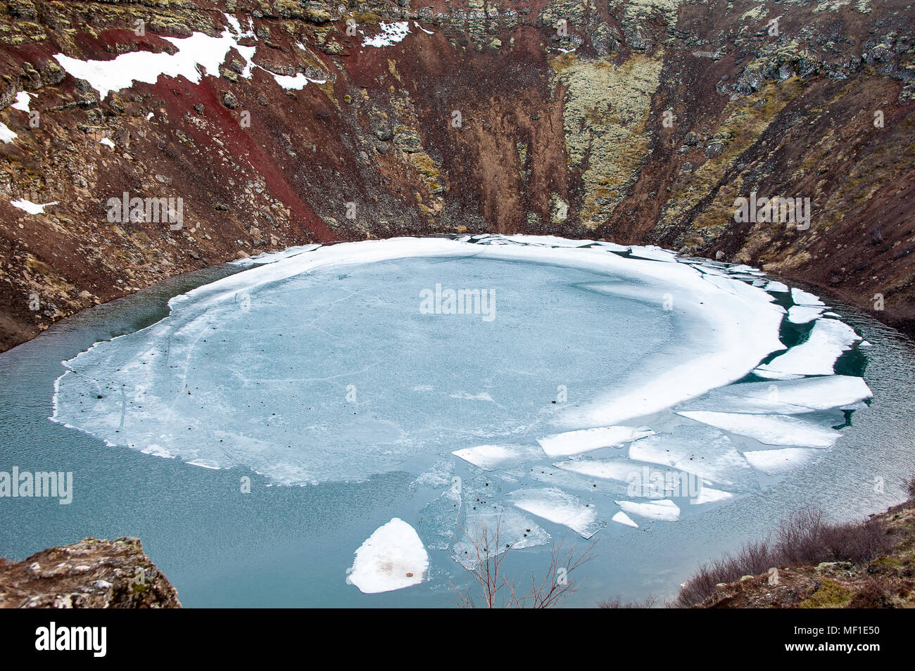 Winter colours of beautiful Kerio, or Kerid crater in Iceland. Red ...