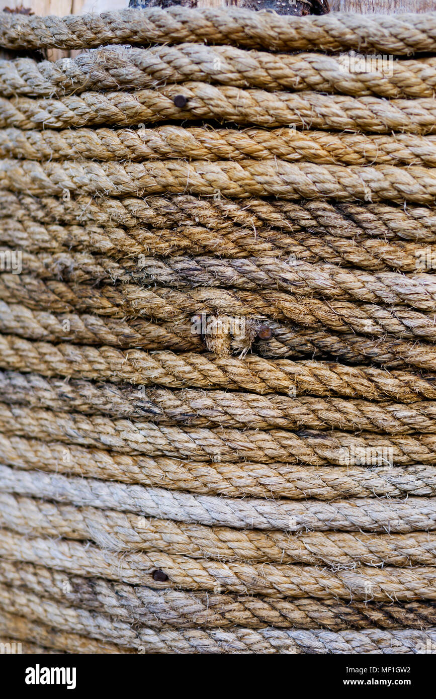 The rope wrapped around the pillars has a knot and crux is used for the ...