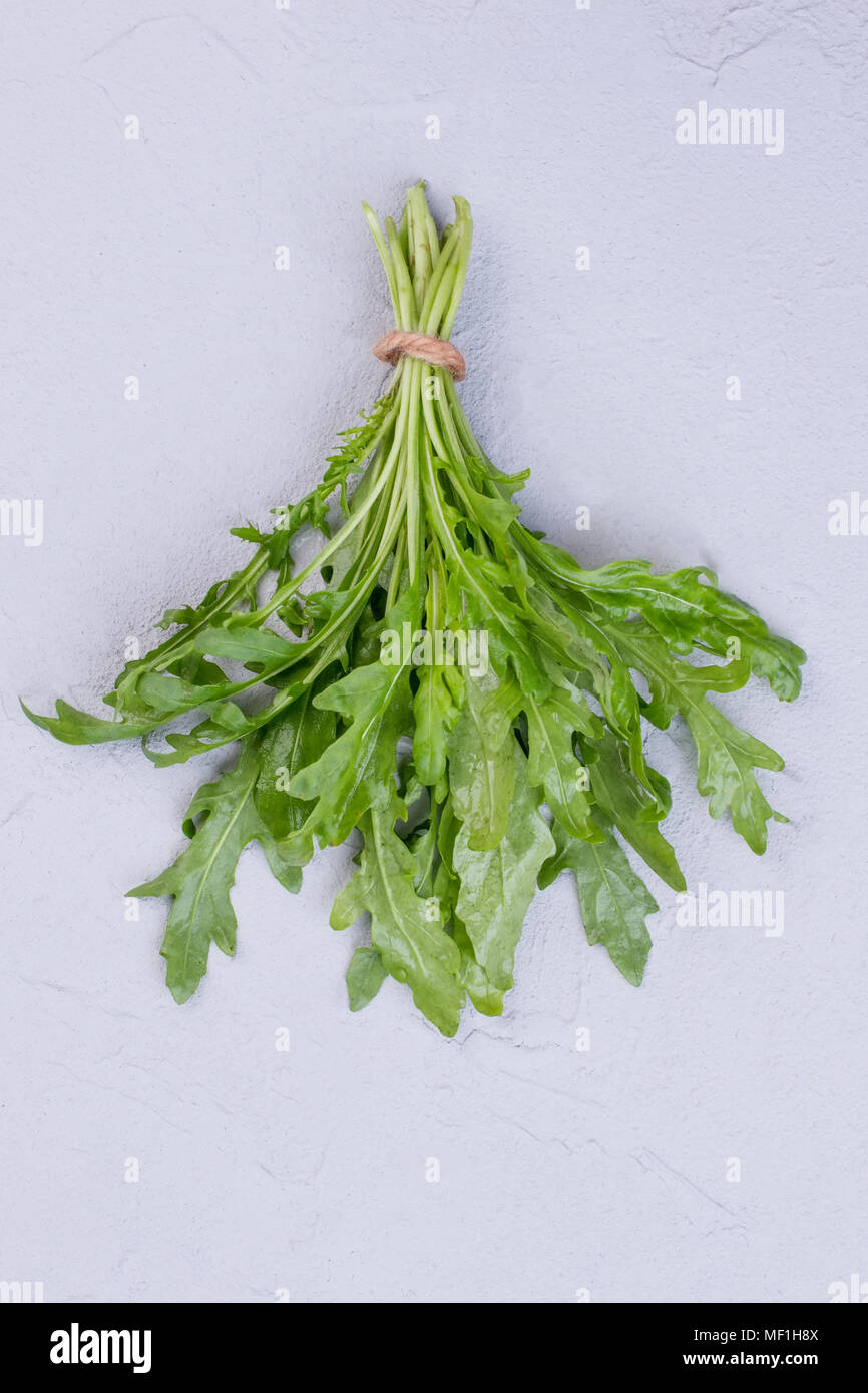 Fresh rocket leaves, top view Stock Photo - Alamy