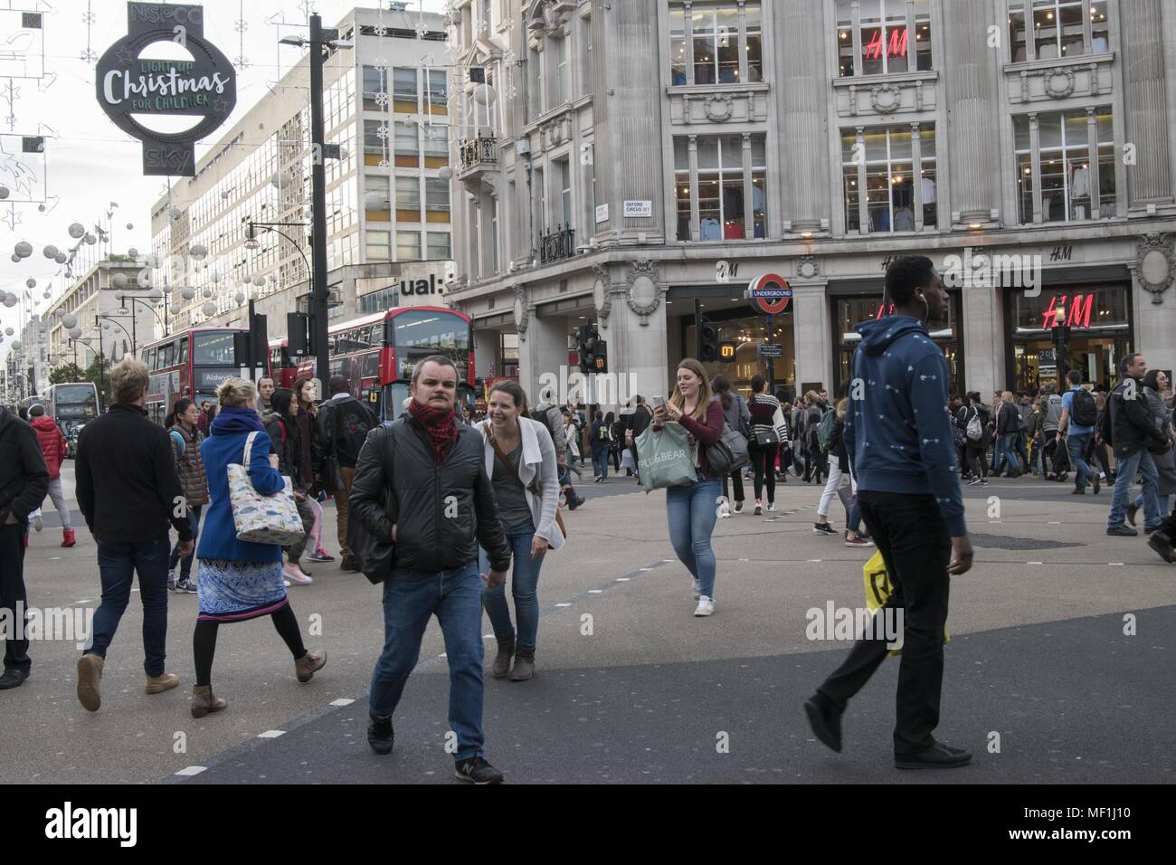Large crowd on Oxford Street in Westminster on the West End of London ...