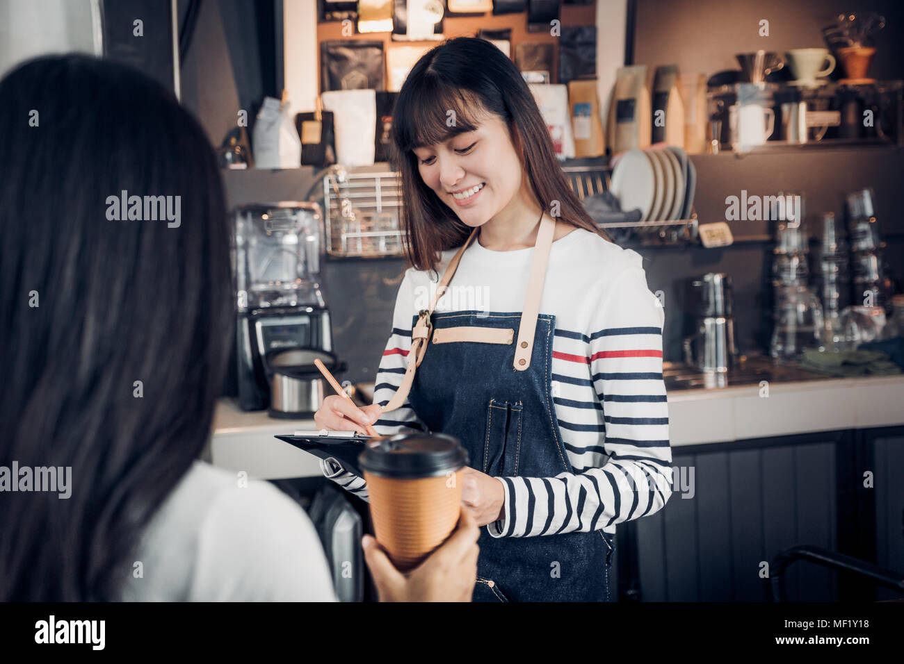 Server waiter barista taking order hi-res stock photography and images ...
