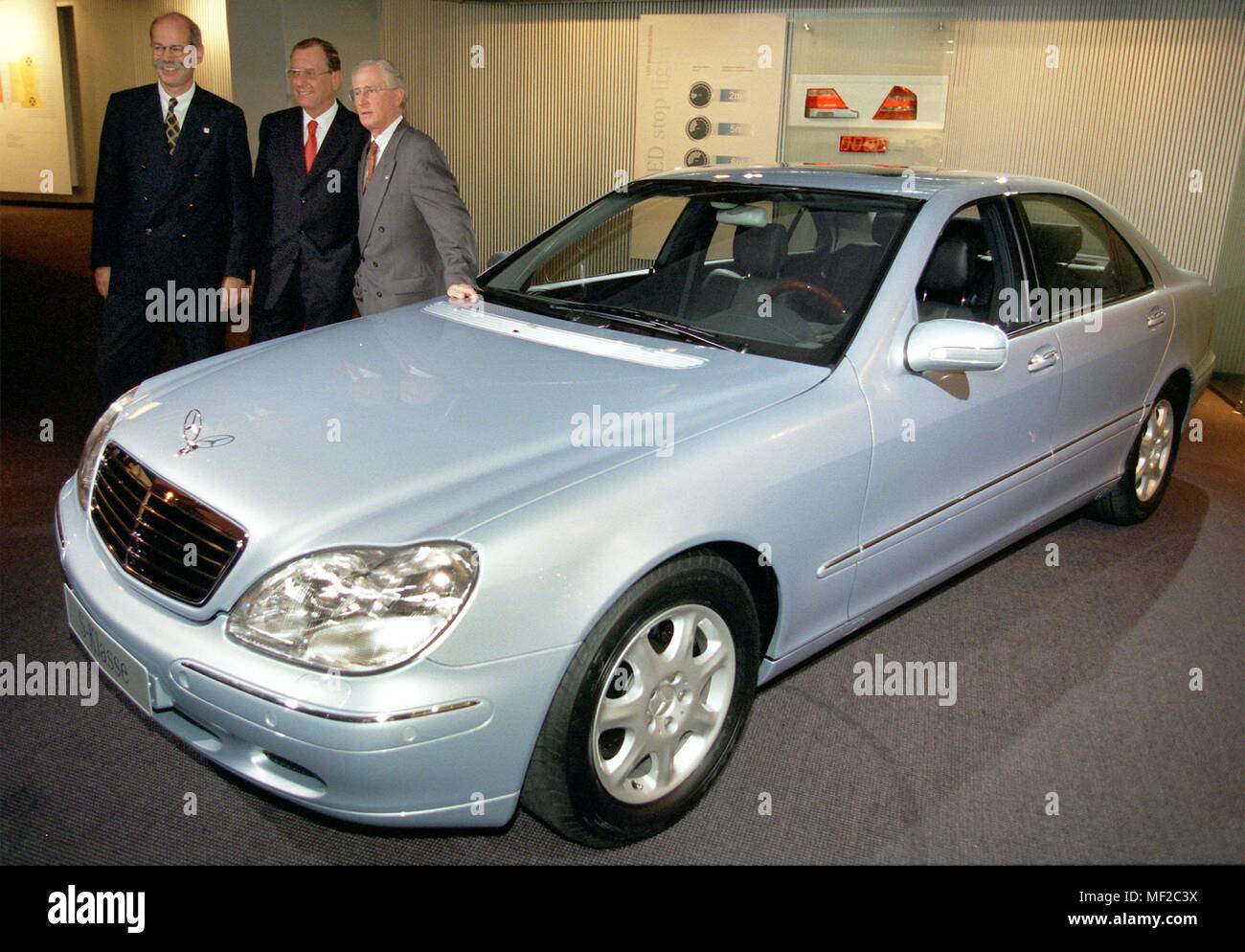 Daimler-Benz's Managing Director Jurgen E. Schrempp (back withte ...