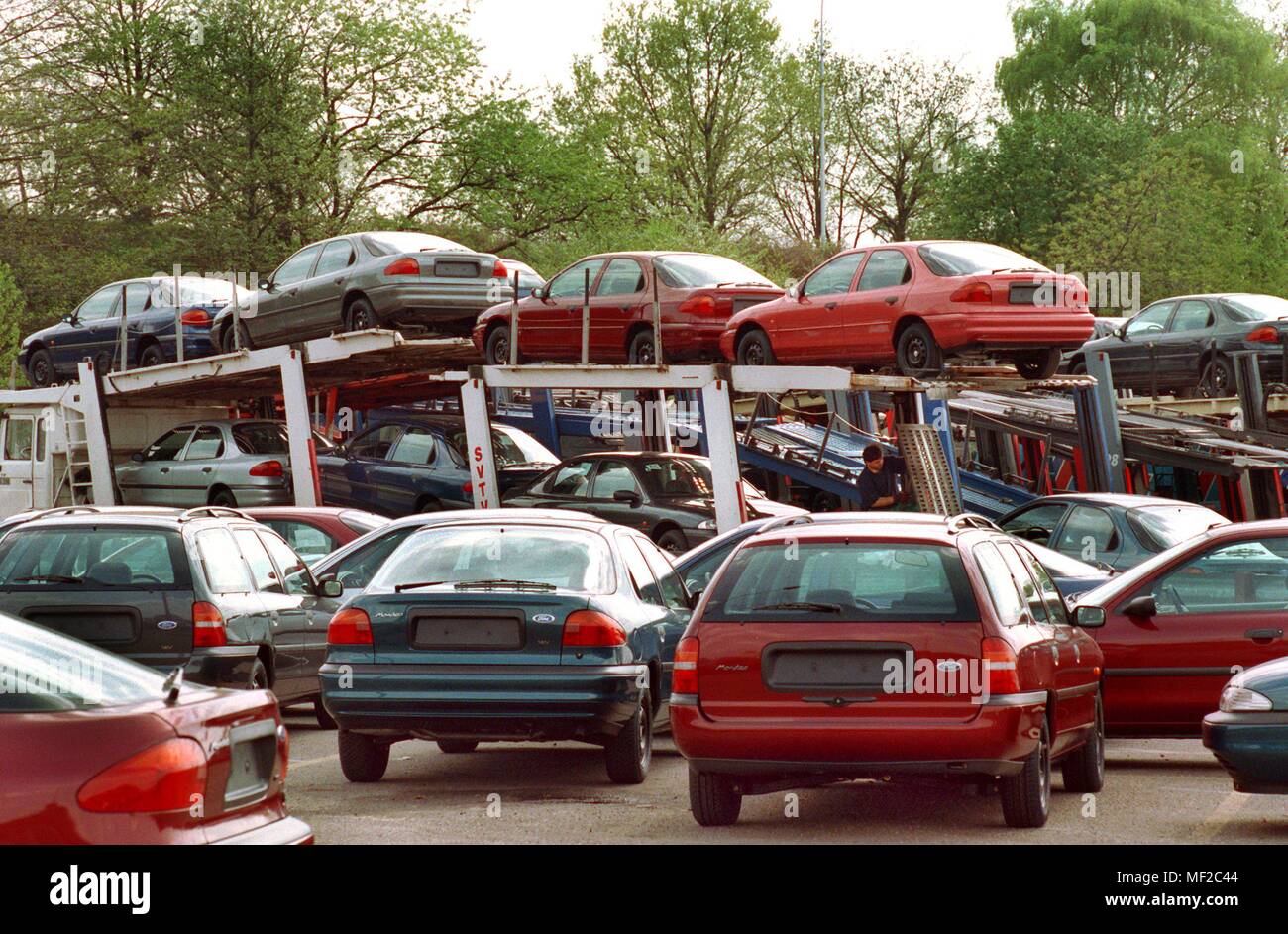 Loading the finished car on a car transporter on the premises of Ford ...