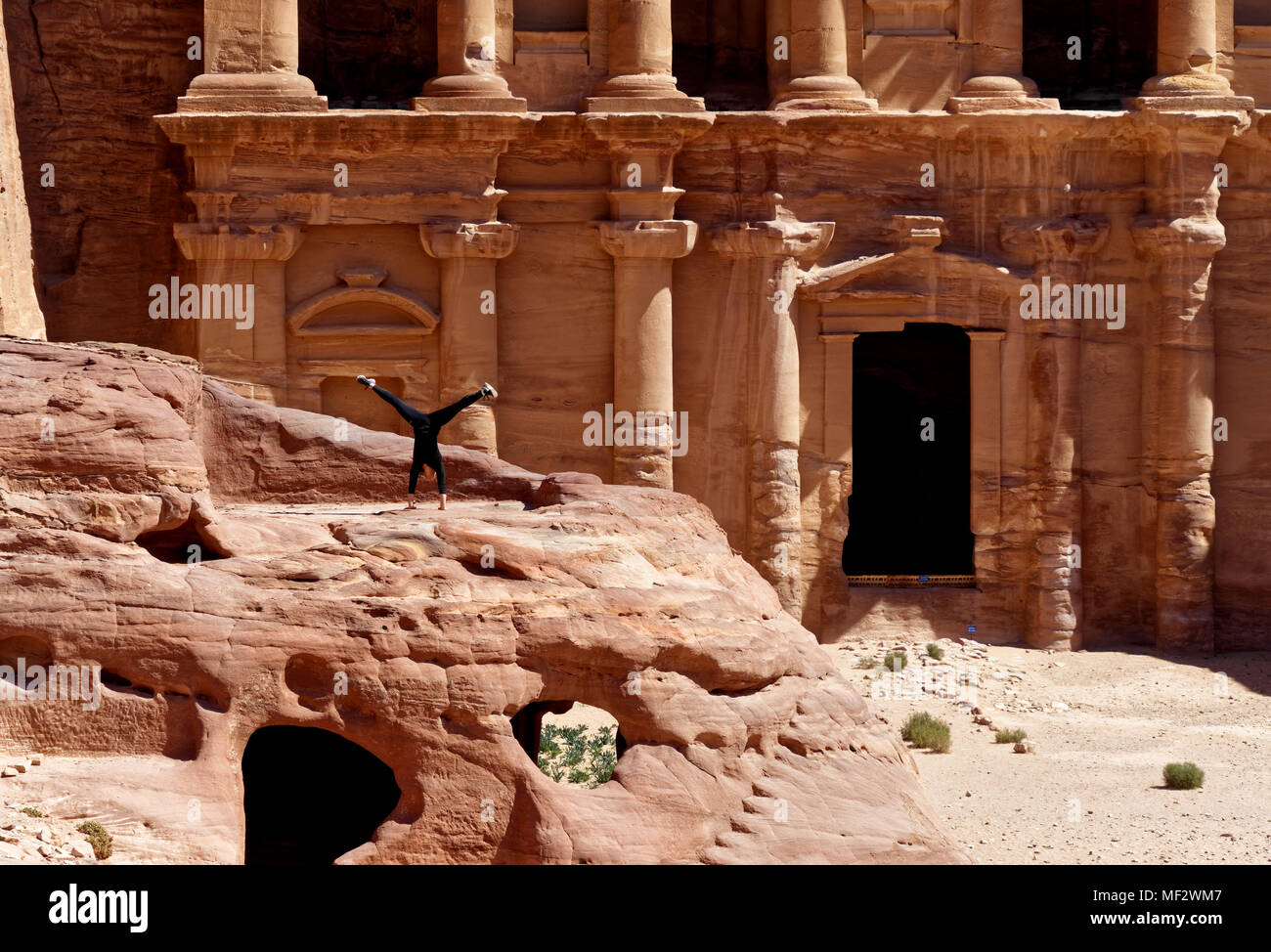 Petra Wadi Musa, Jordan, March 9, 2018: A young tourist in a black ...