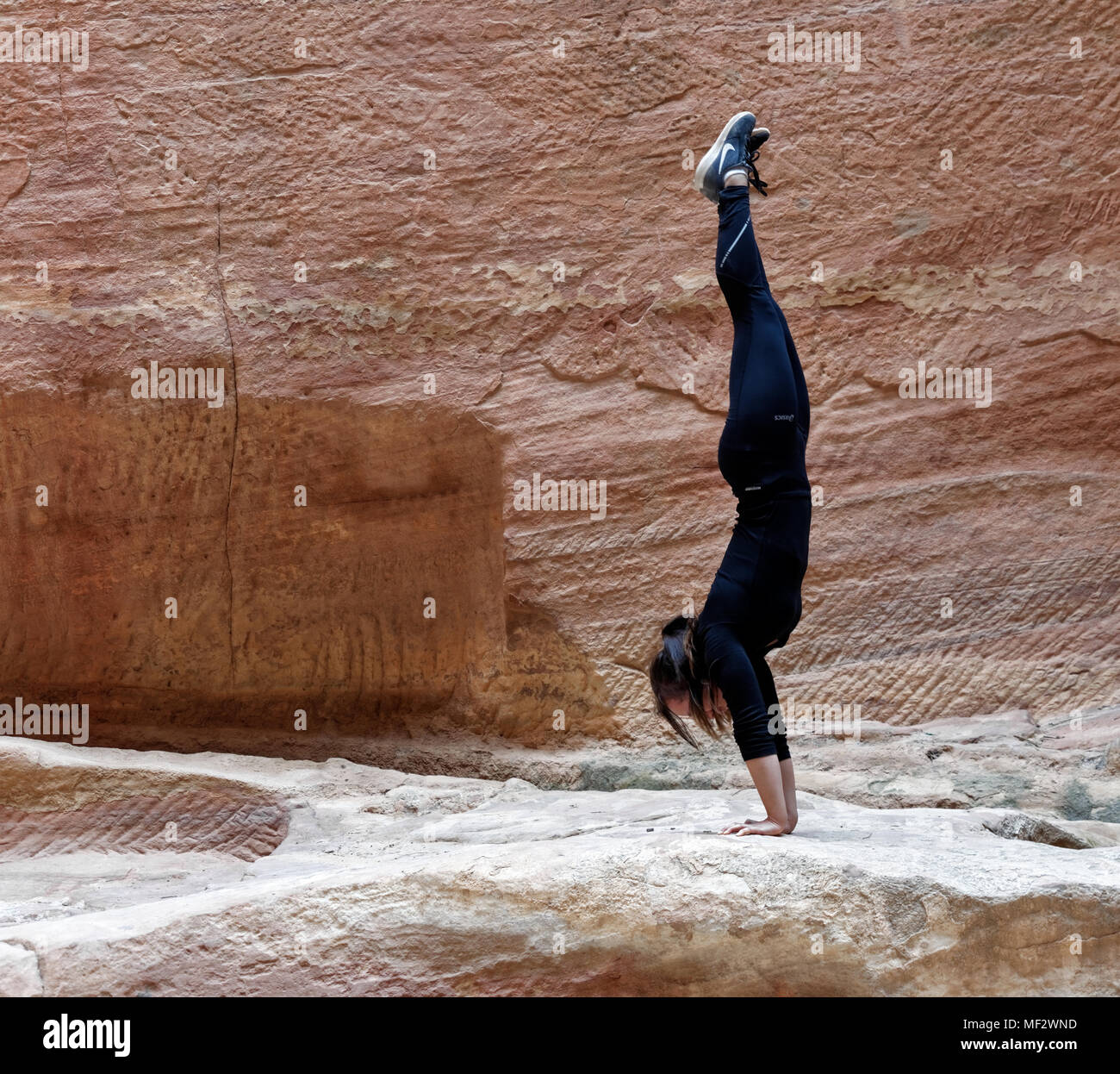 Woman handstand dress hi-res stock photography and images - Alamy