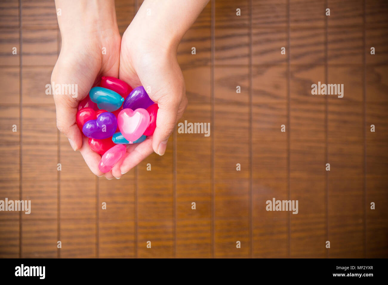 Multi colored hands hi-res stock photography and images - Alamy