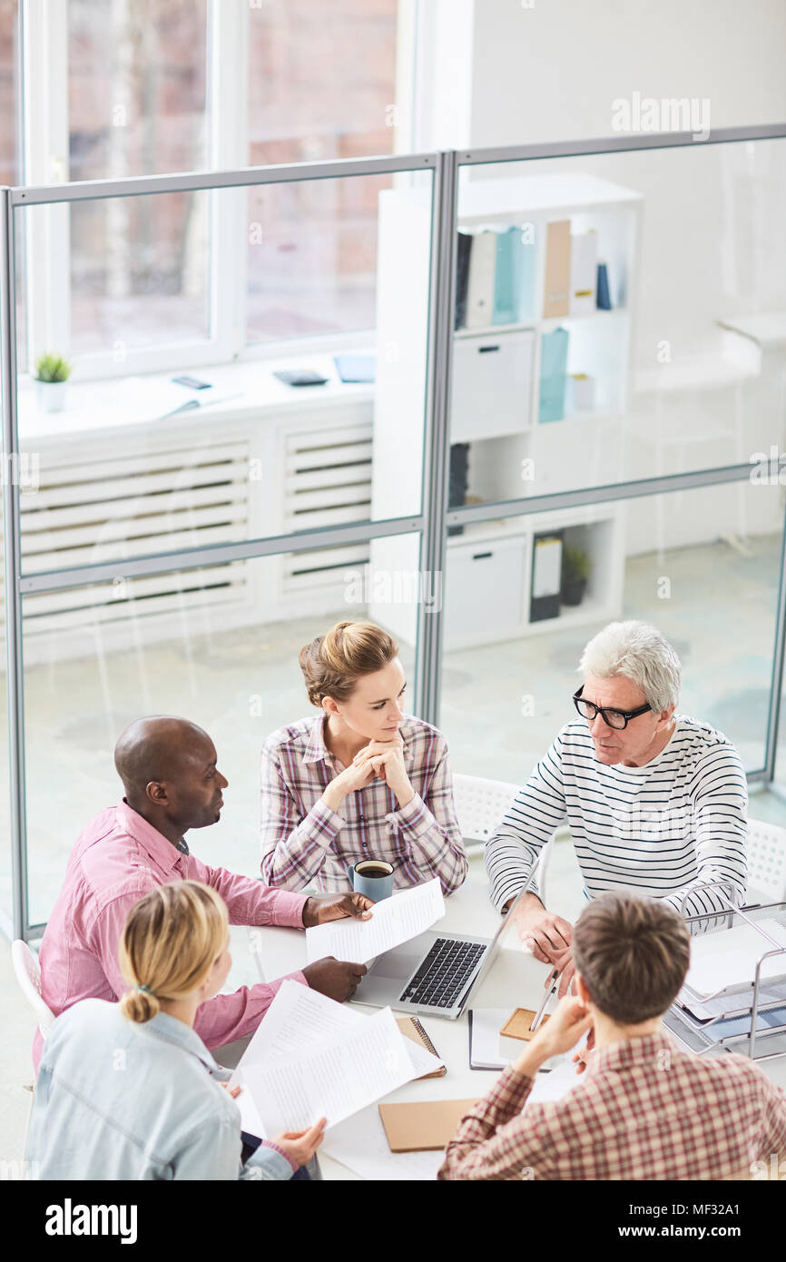 Business people communicating during a meeting at modern office Stock ...