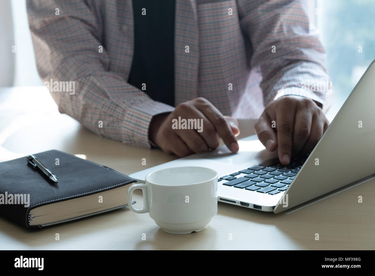 man working computer table hand touching laptop business strategy ...