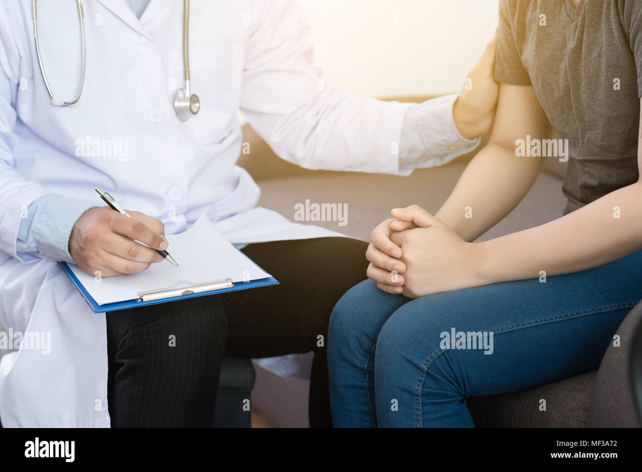 Medicine and health care concept Doctor and patient discussing ...
