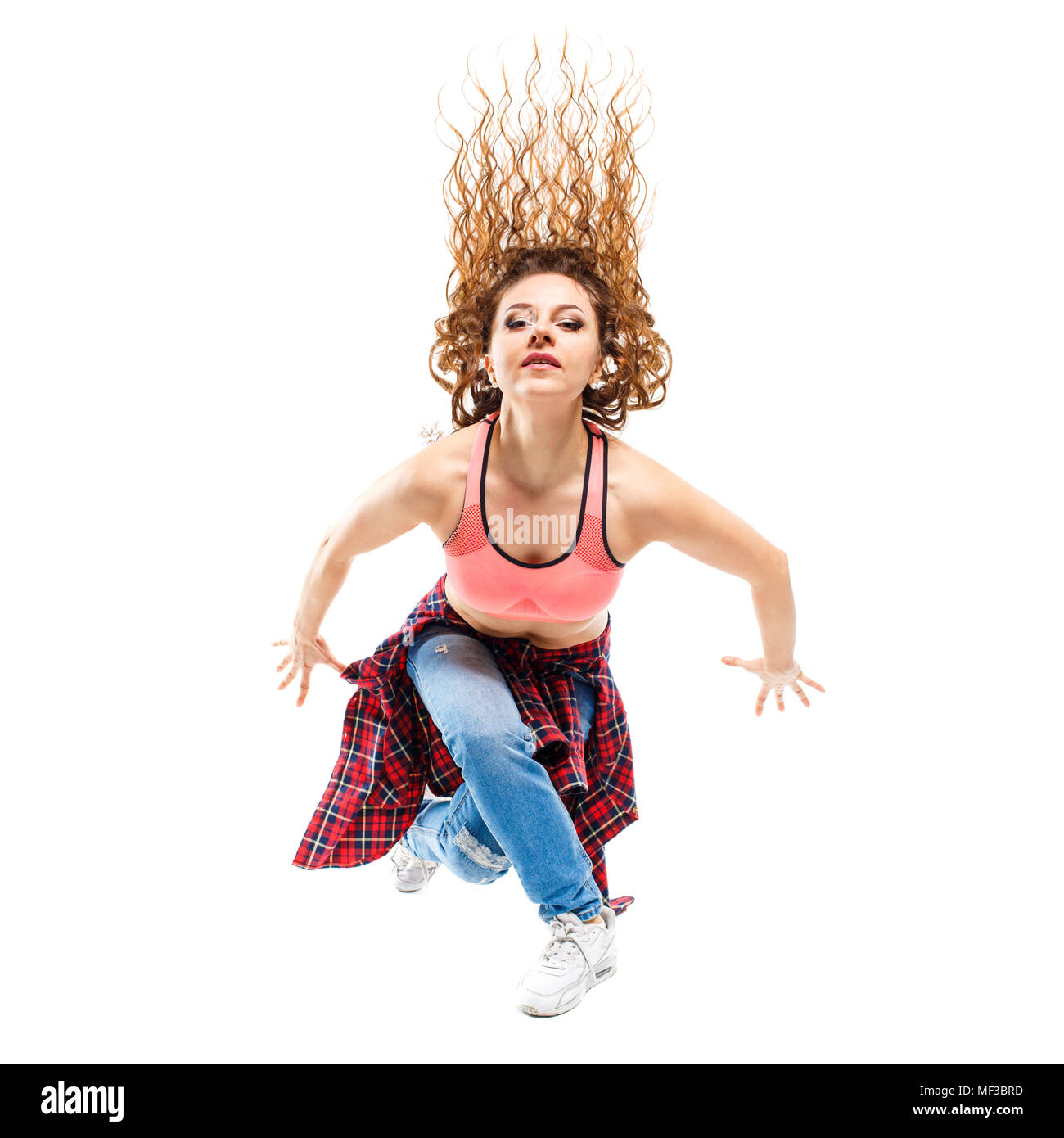 Young smiling fitness girl dancing zumba isolated on white background ...