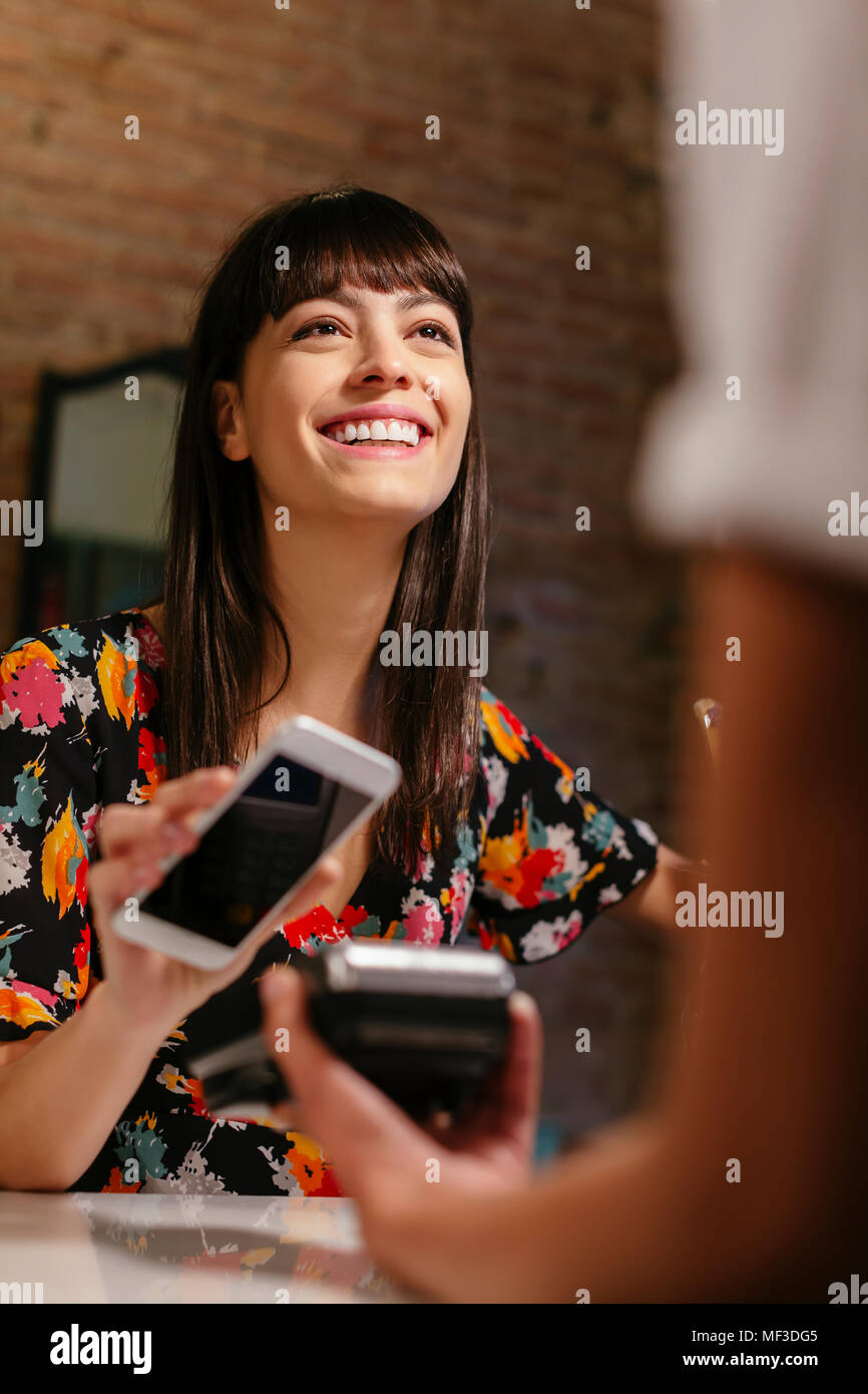 Smiling customer hi-res stock photography and images - Alamy
