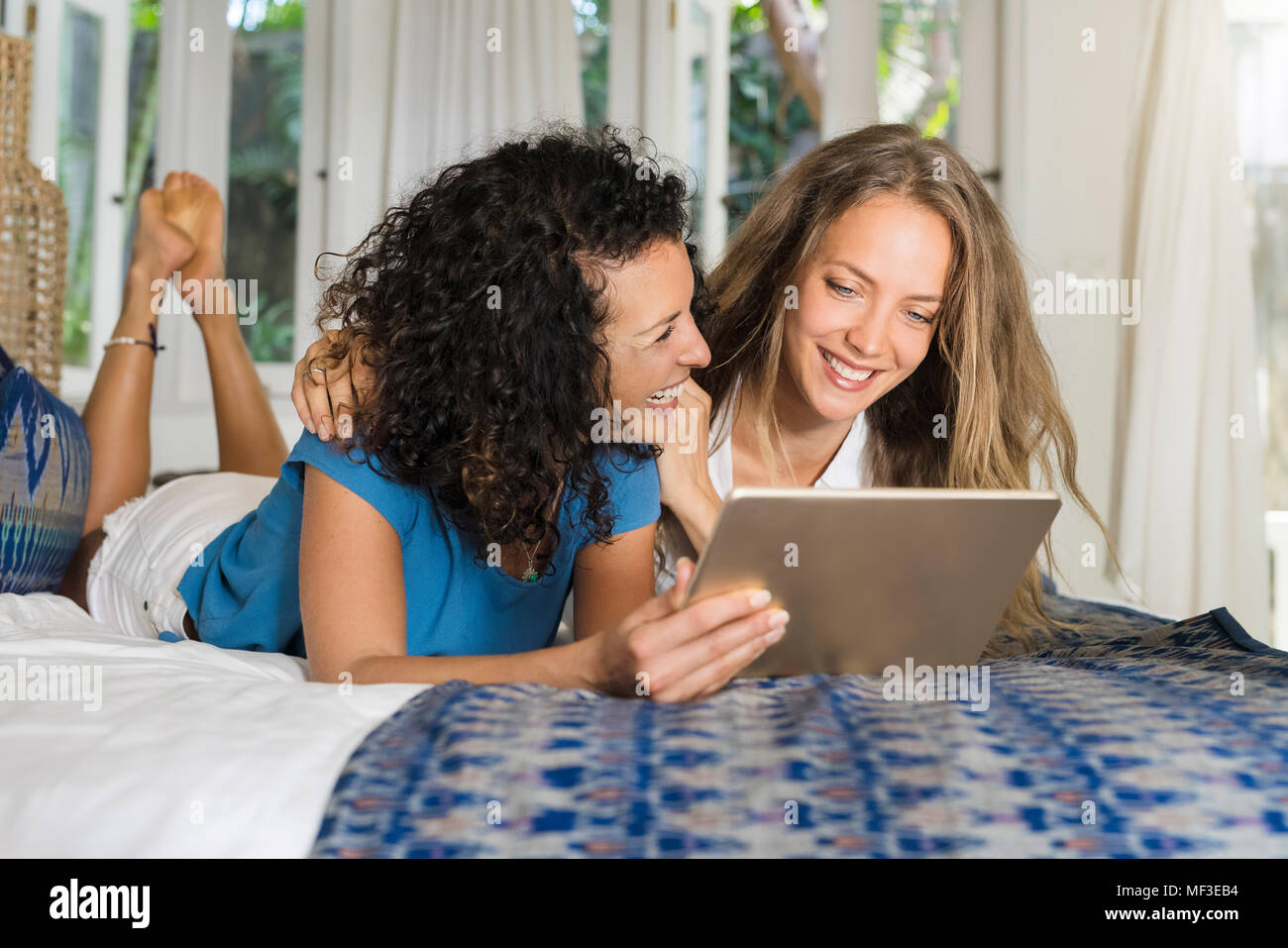 Lying in women hi-res stock photography and images - Alamy