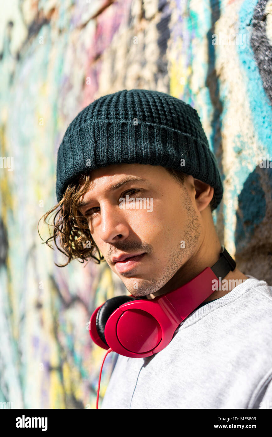 Young man with red cap hi-res stock photography and images - Alamy