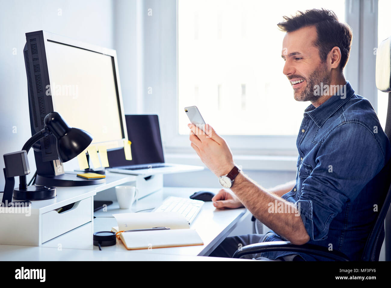 Desk phone office man hi-res stock photography and images - Alamy
