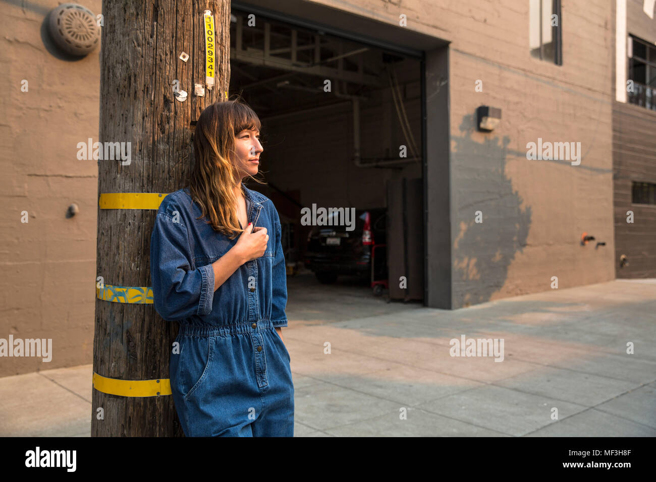 Urban pole woman hi-res stock photography and images - Alamy
